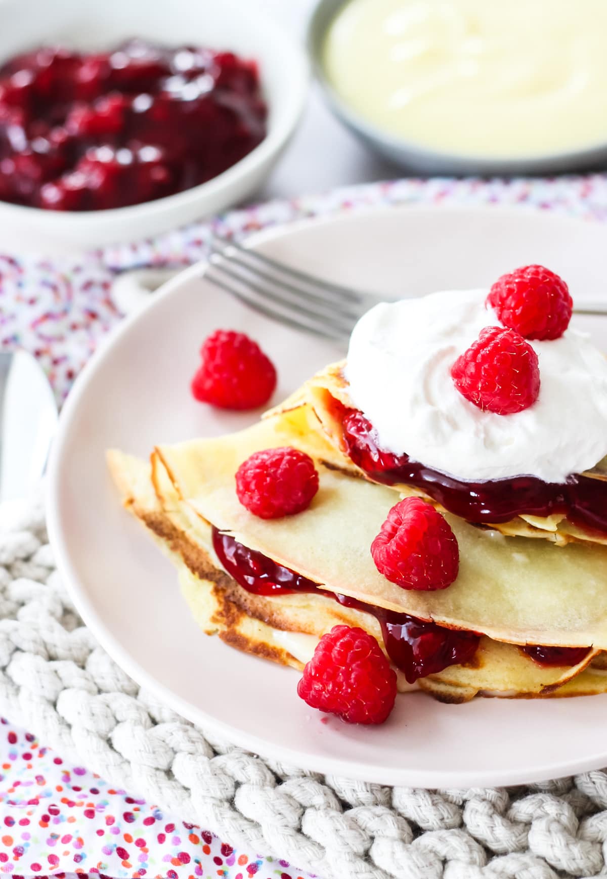 Raspberry Crepes with Vanilla Pudding and Whipped Cream - Our Tasty Kitchen