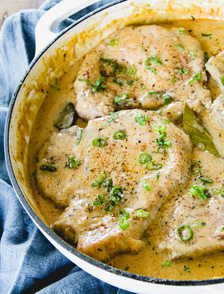 Easy Creamy Smothered Pork Chops - A Pretty Life In The Suburbs